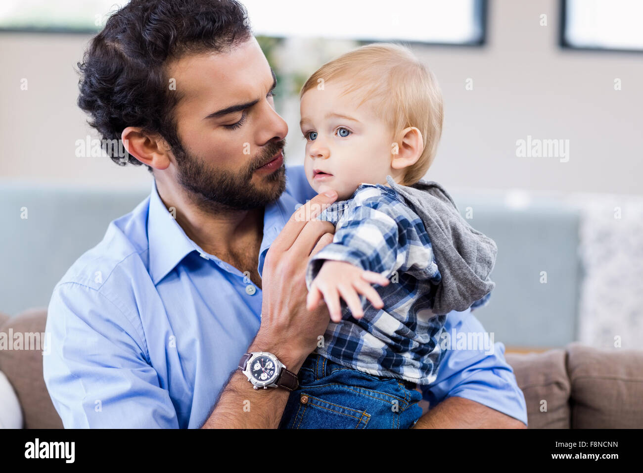 Handsome man with child Stock Photo - Alamy