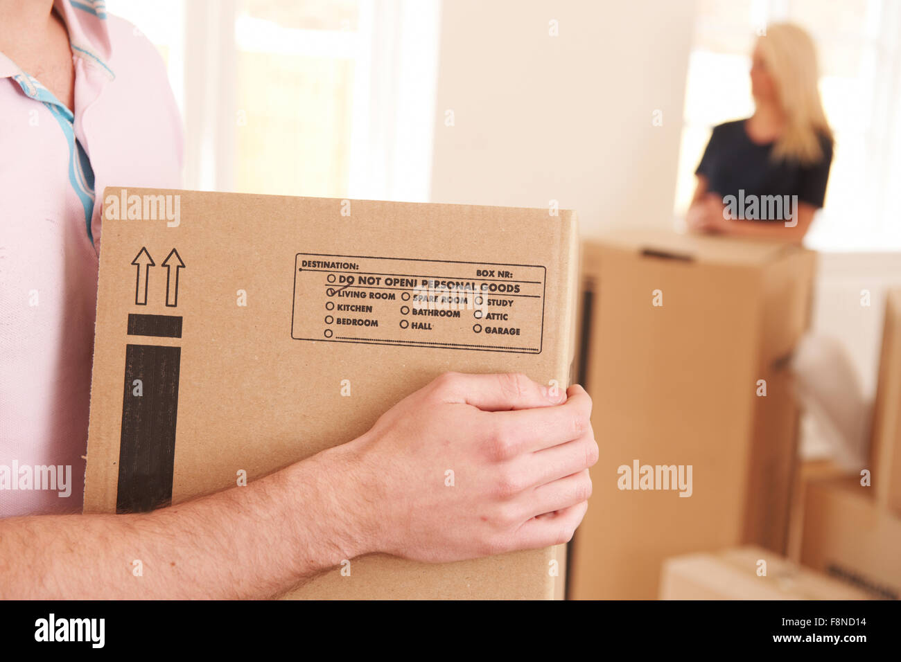 Man carrying woman indoors hi-res stock photography and images - Alamy