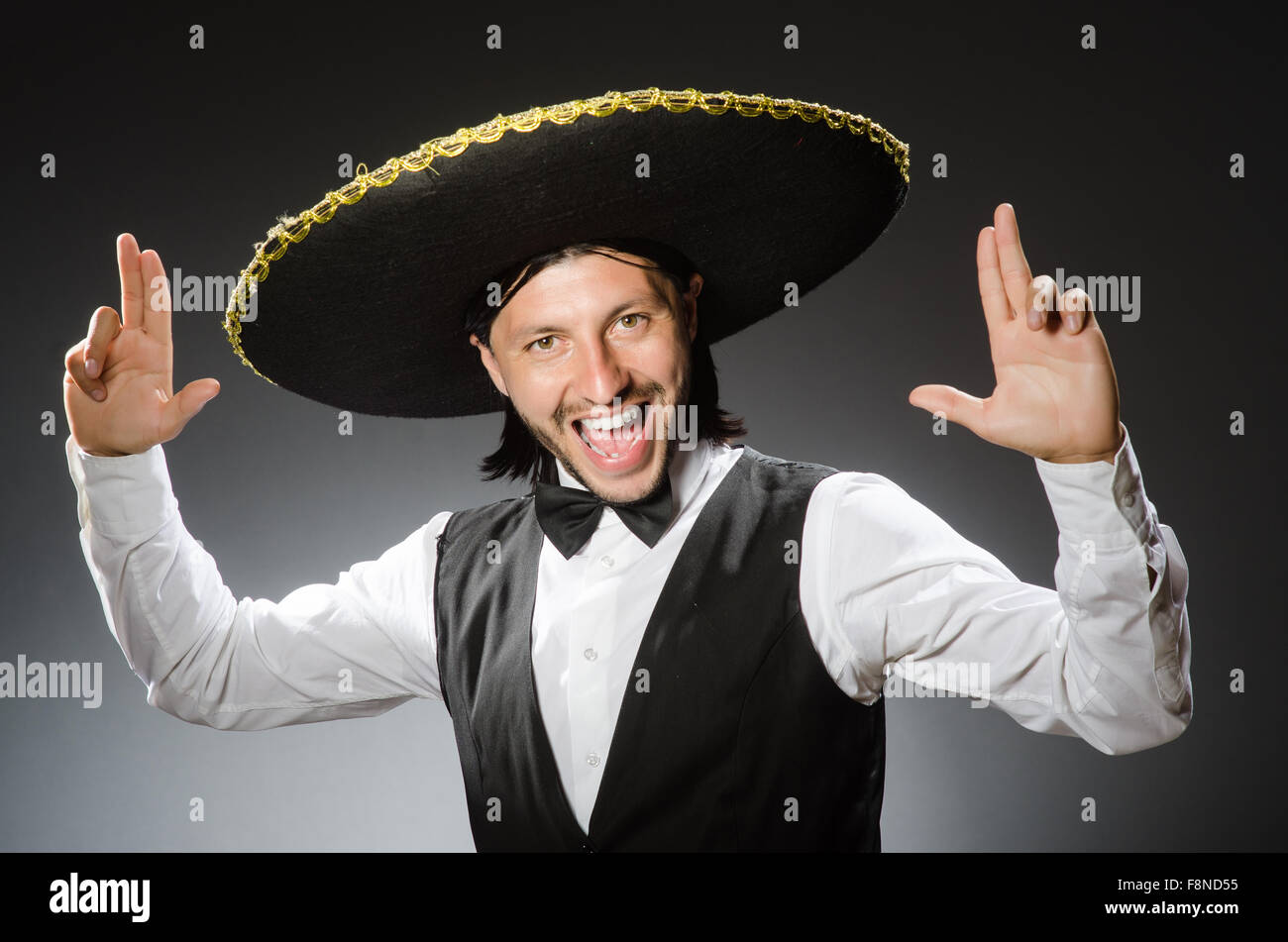 Mexican man wears sombrero isolated on white Stock Photo - Alamy