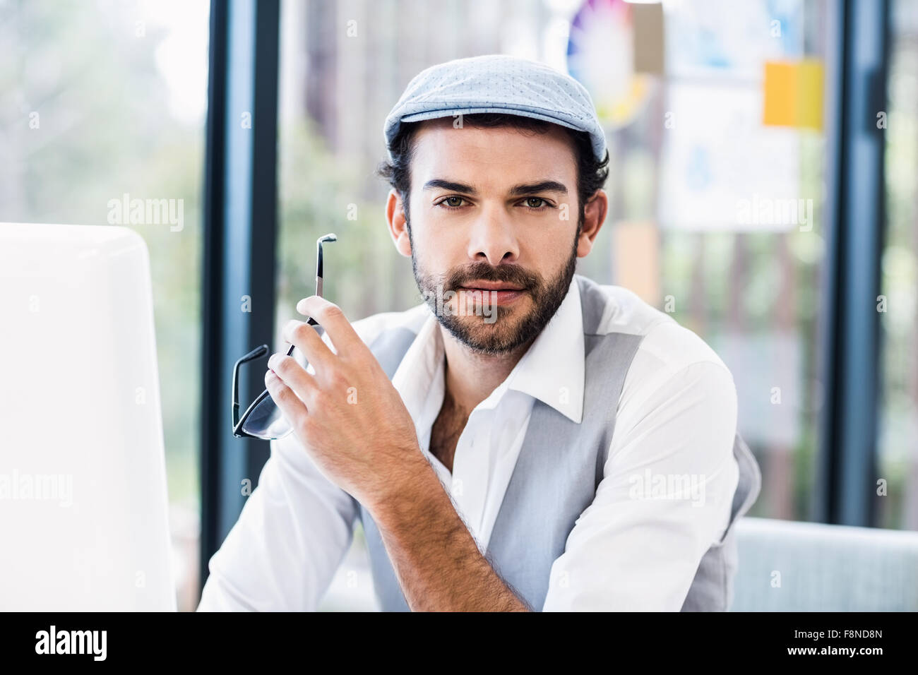 Smiling man posing for camera Stock Photo - Alamy