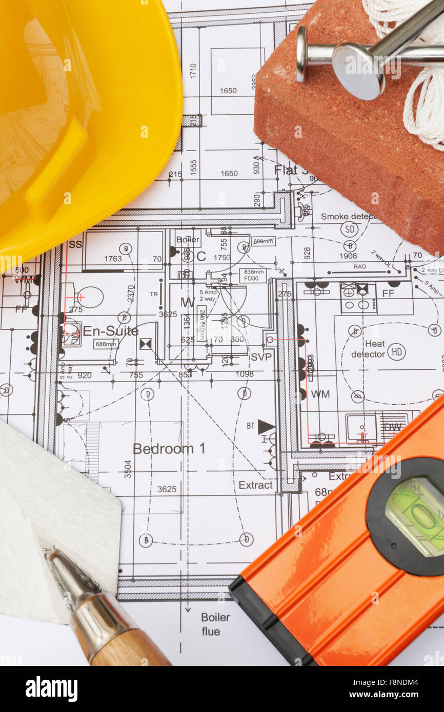 Building Components Arranged On House Plans Stock Photo - Alamy