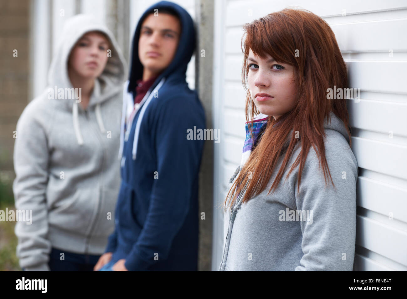 Gang Of Teenagers Hanging Out In Urban Environment Stock Photo - Alamy