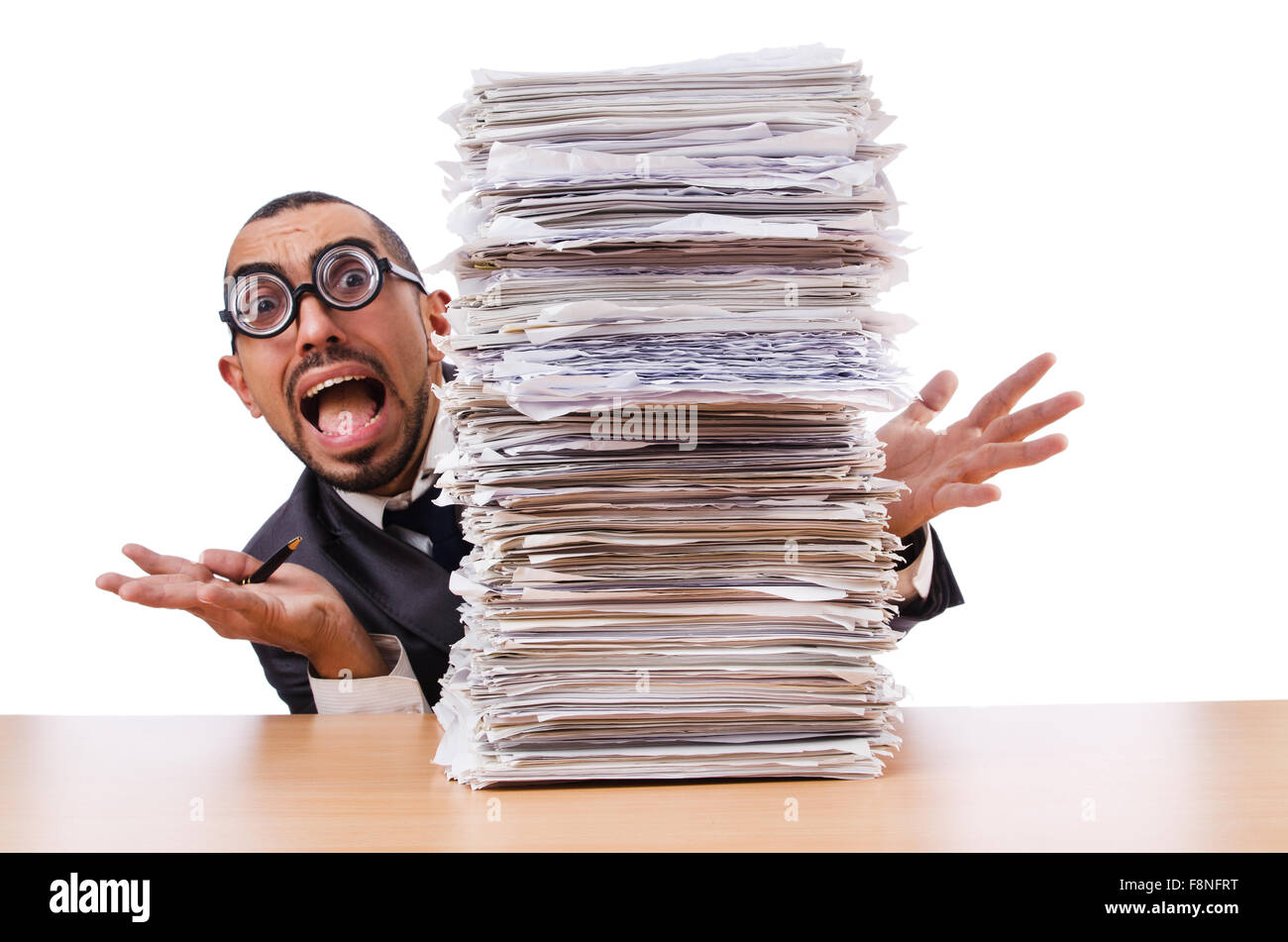Man with too much work to do Stock Photo - Alamy