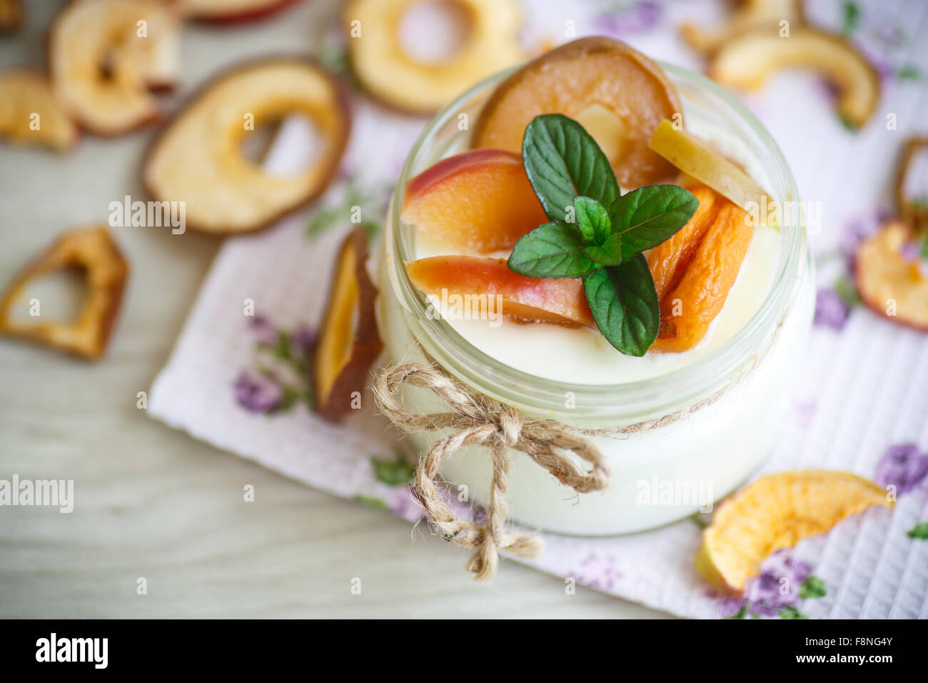 home sweet yogurt with dried fruit Stock Photo - Alamy