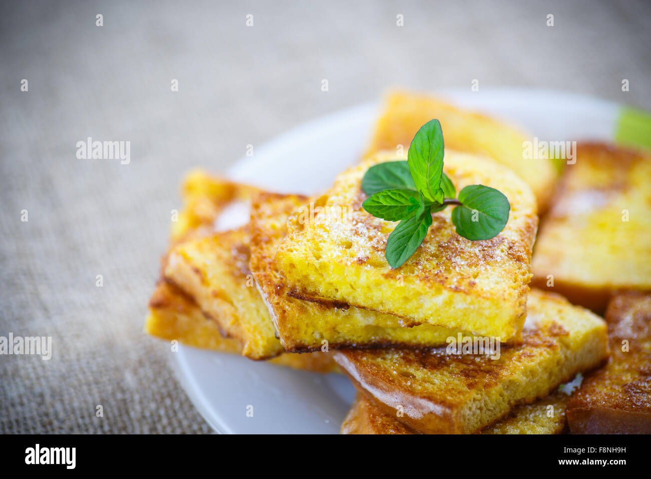 sweet toast fried egg sprinkled Stock Photo - Alamy