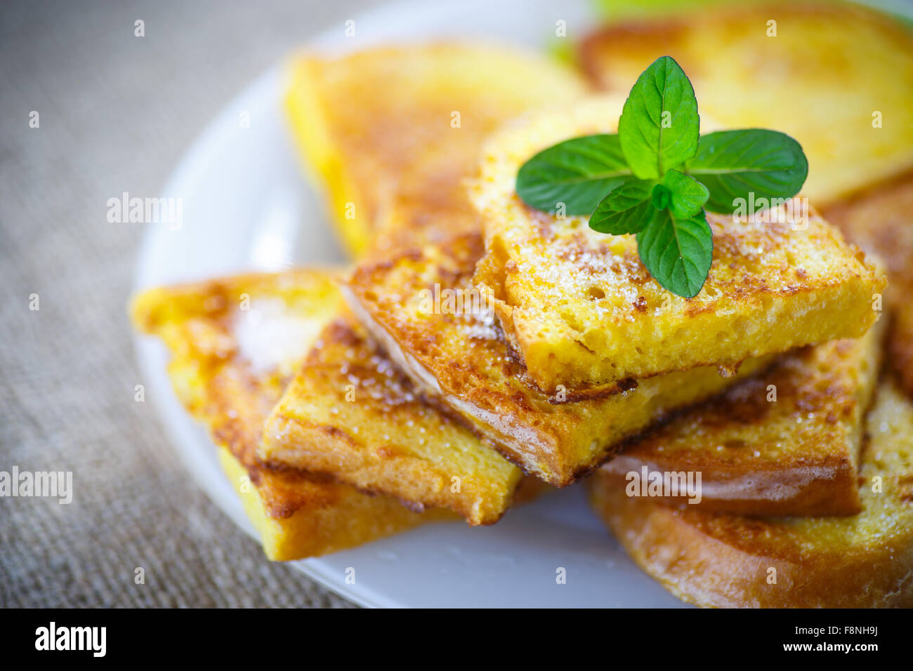sweet toast fried egg sprinkled Stock Photo - Alamy