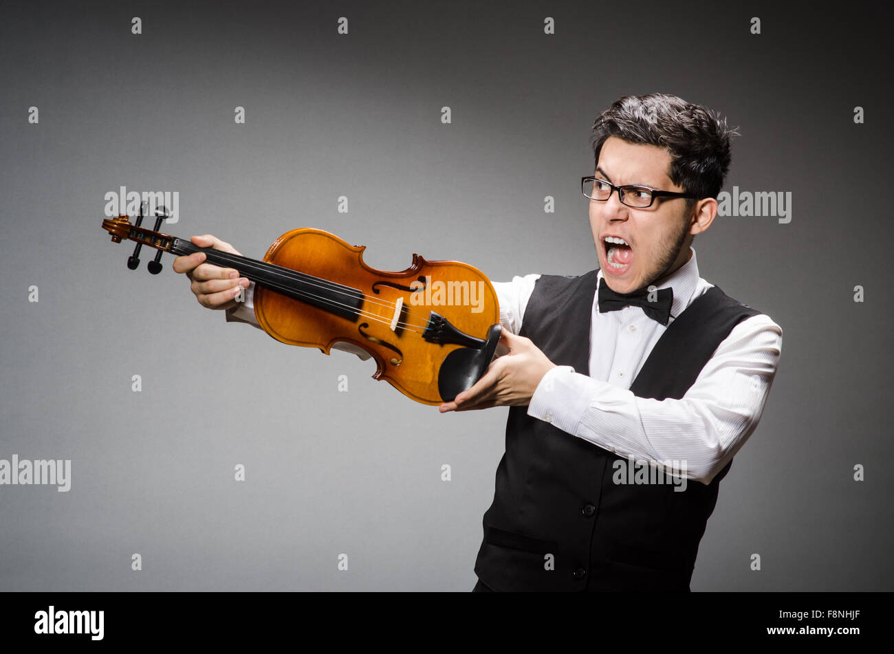 Funny violin player with fiddle Stock Photo - Alamy