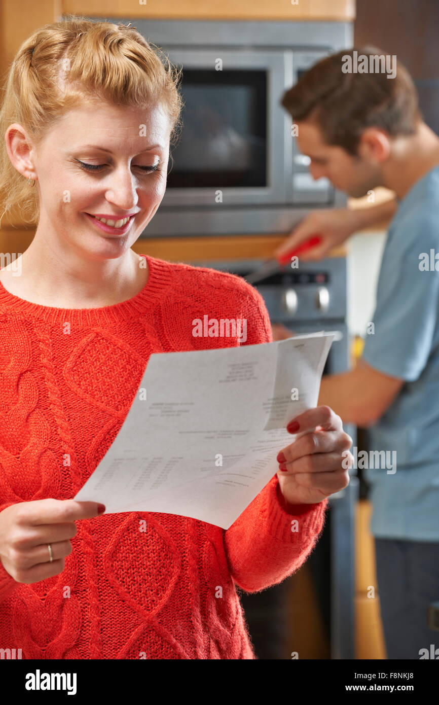 Happy Customer With Repair Bill Stock Photo - Alamy