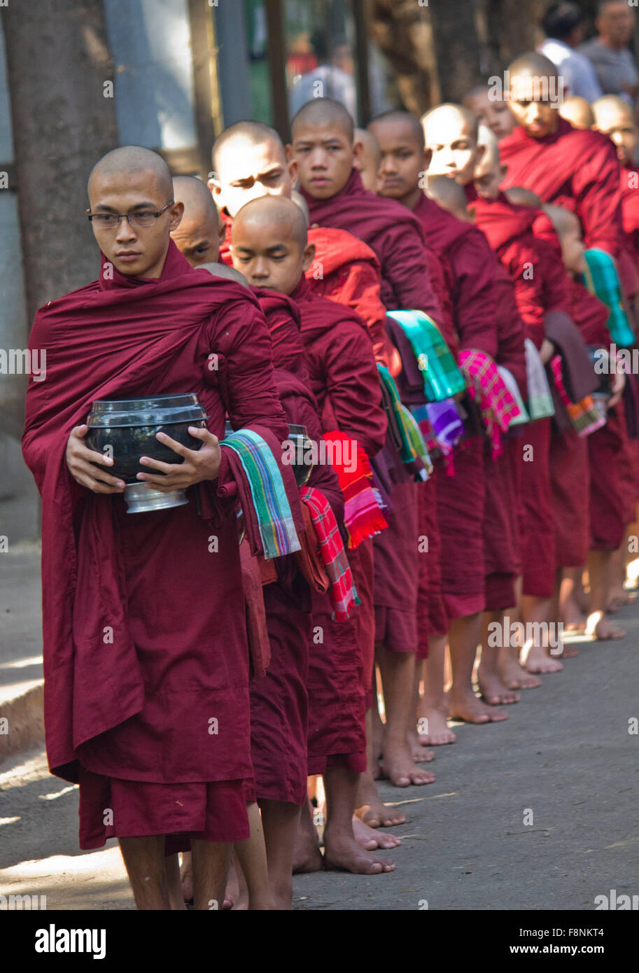 Monks in a row: Mahagandayon Monastery. Monks, collectively known as ...