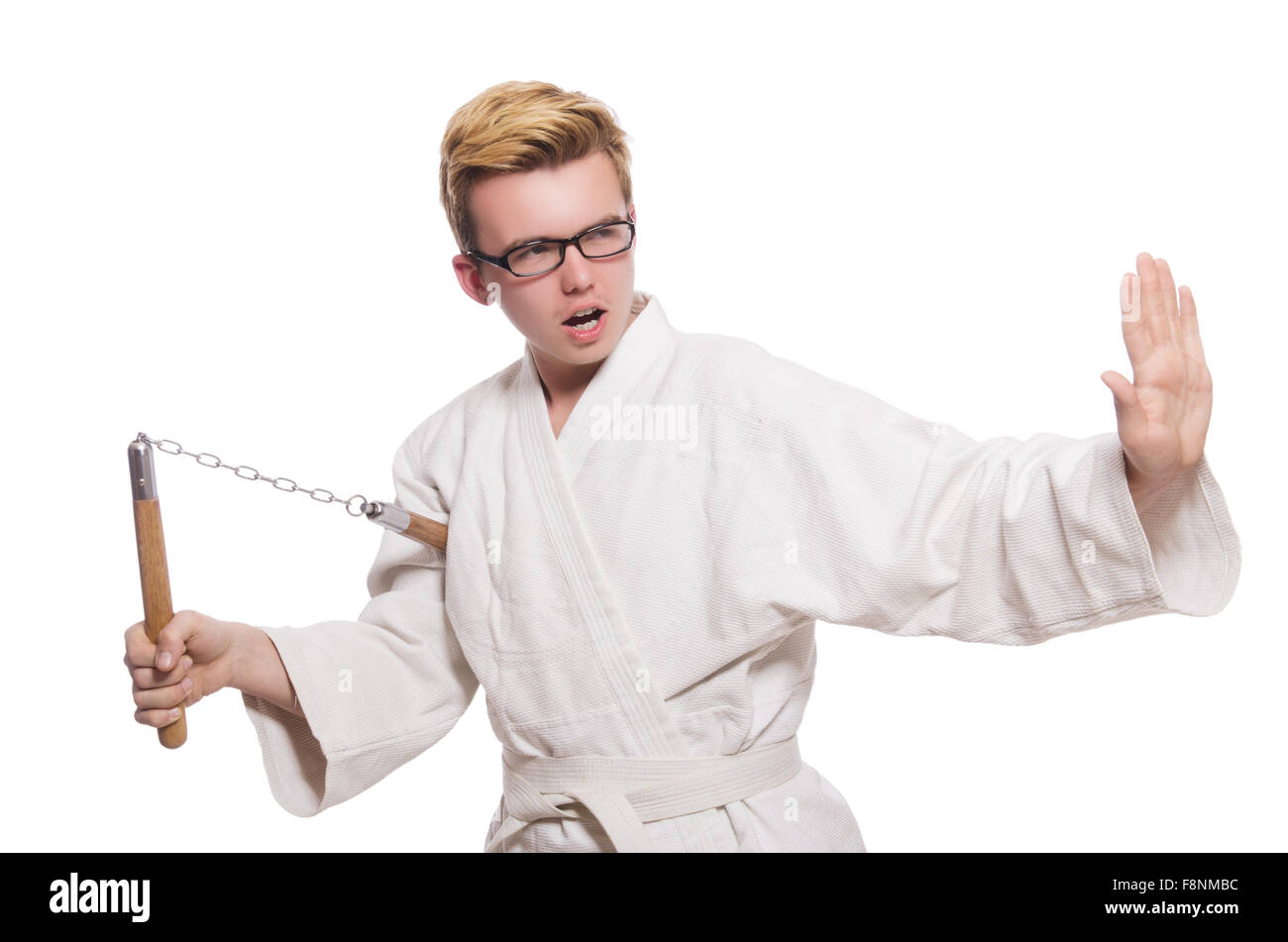 Funny karate fighter with nunchucks on white Stock Photo - Alamy