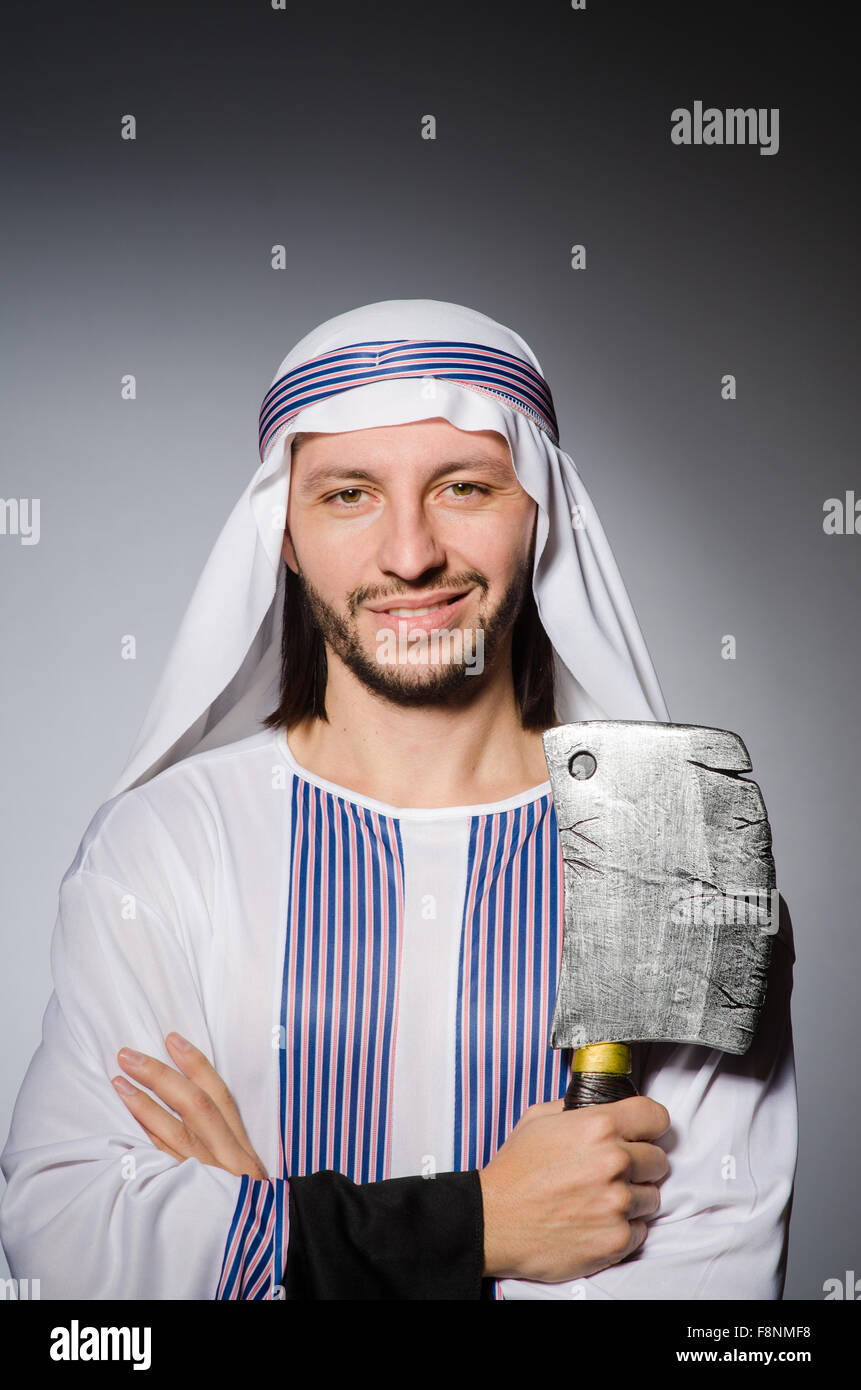 Arab man with sharp axe Stock Photo - Alamy