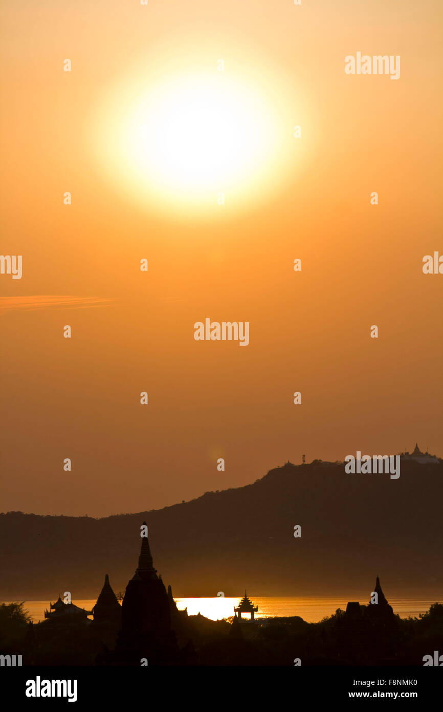 Sunset, River and temples in Bagan, Myanmar. Vertical shot Stock Photo ...