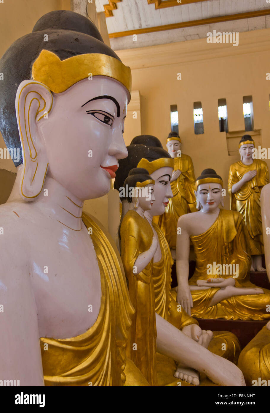 YANGON, MYANMAR - FEBRUARY 2014: Traditional burmese Buddha Statue ...