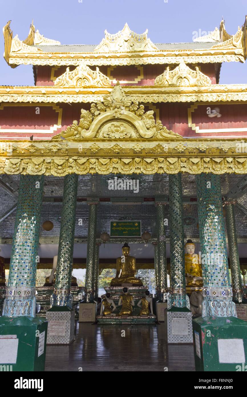 YANGON, MYANMAR - FEBRUARY 2014: Traditional burmese Buddha Statue ...