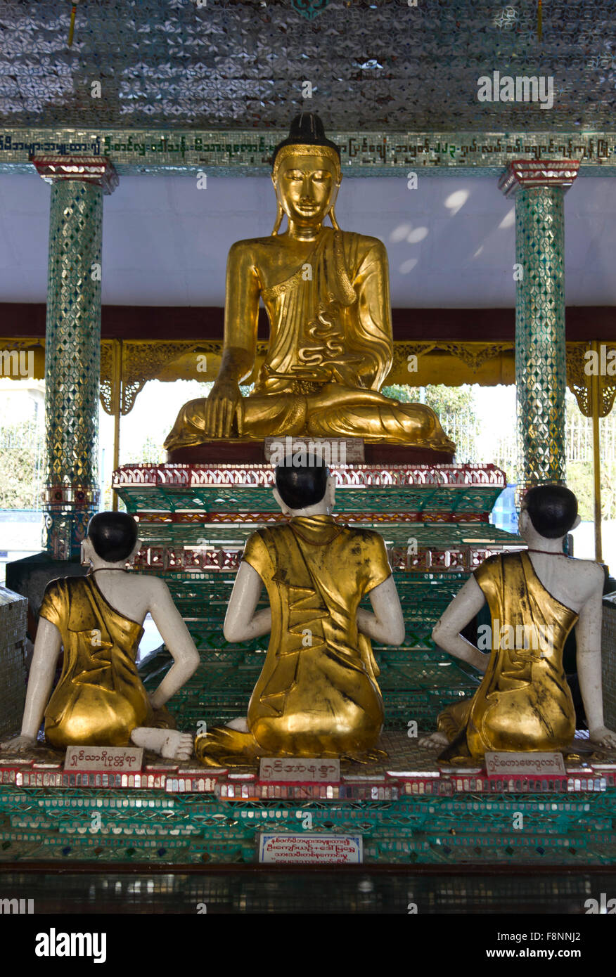 YANGON, MYANMAR - FEBRUARY 2014: Traditional burmese Buddha Statue ...