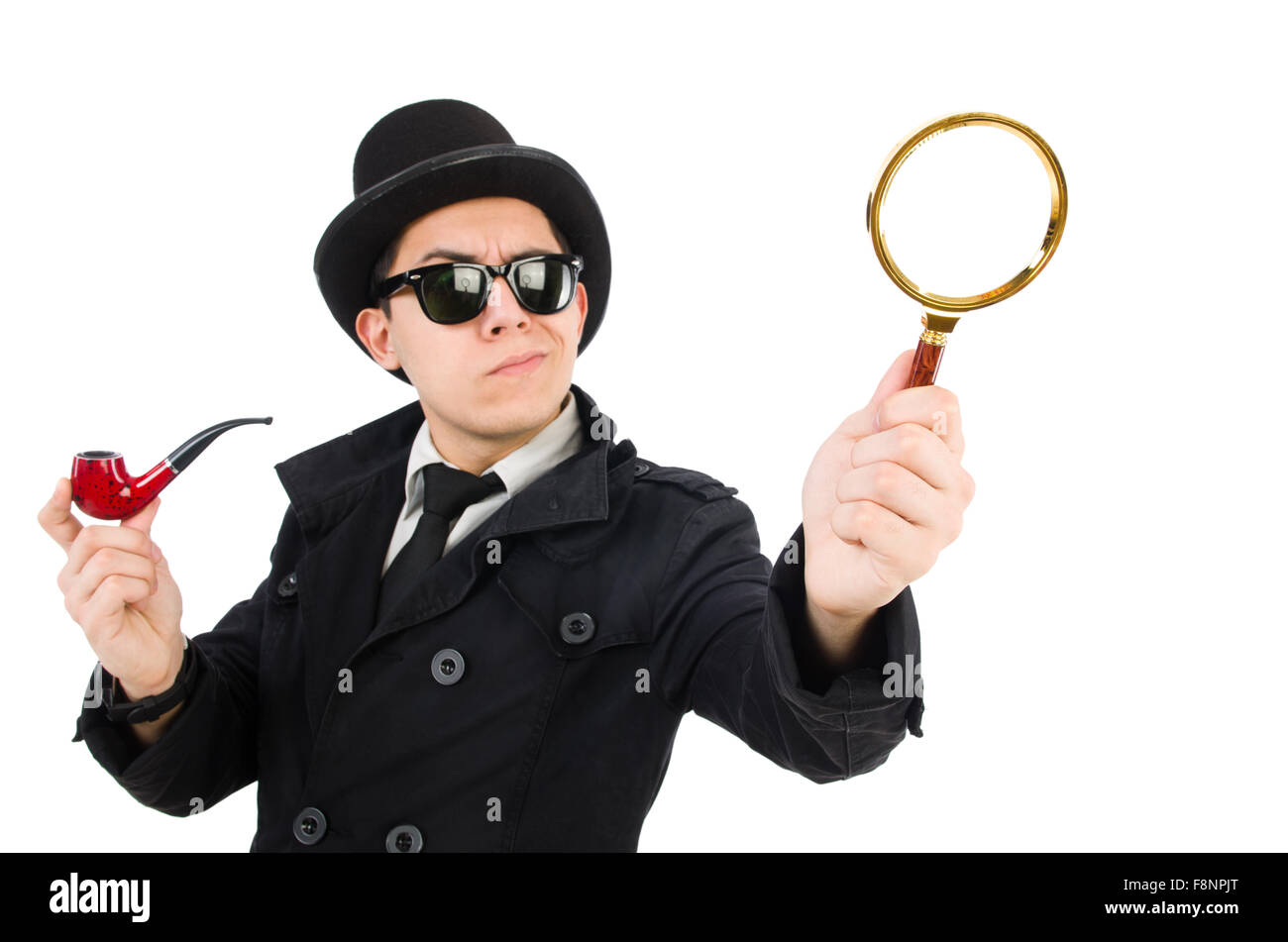 Young detective with pipe and magnifying glass Stock Photo - Alamy