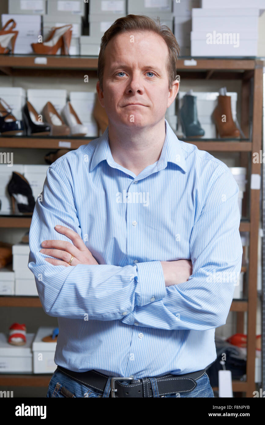 Male Owner Of Shoe Store Stock Photo - Alamy