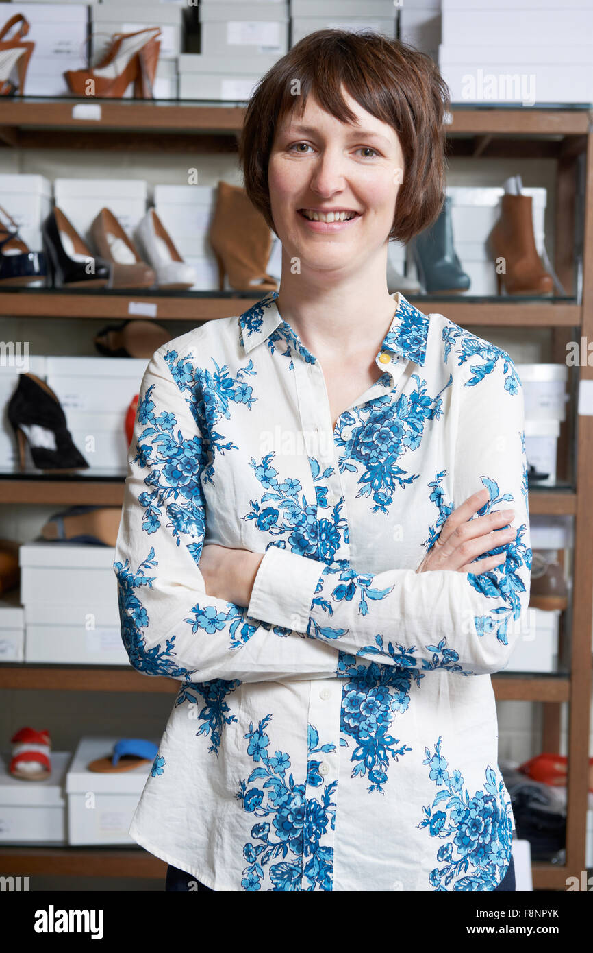 Female Owner Of Shoe Shop Stock Photo - Alamy