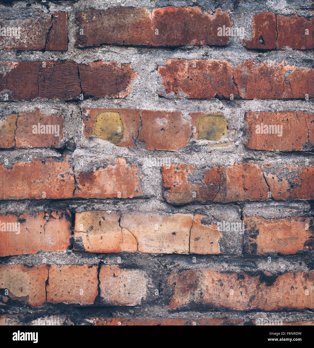 Background of colorful brick wall texture. brickwork. Peeling paint ...