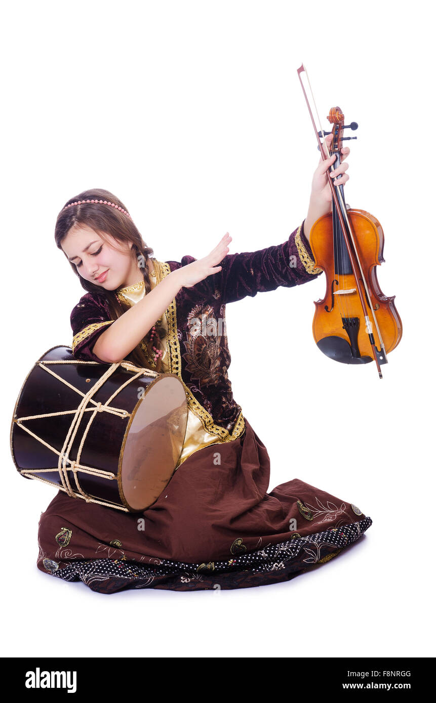 Young woman playing musical instruments on white Stock Photo - Alamy