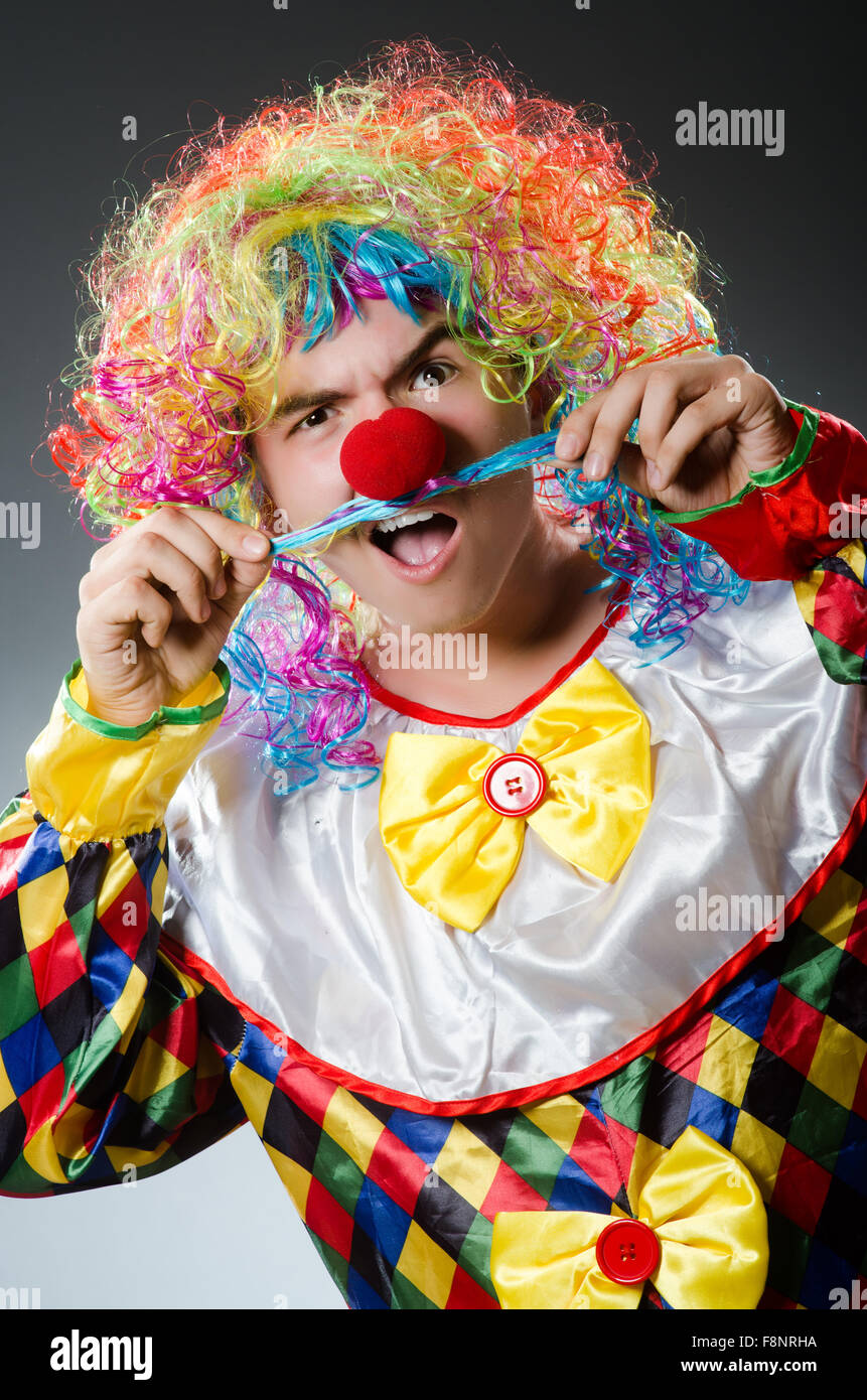 Funny clown in the studio Stock Photo - Alamy
