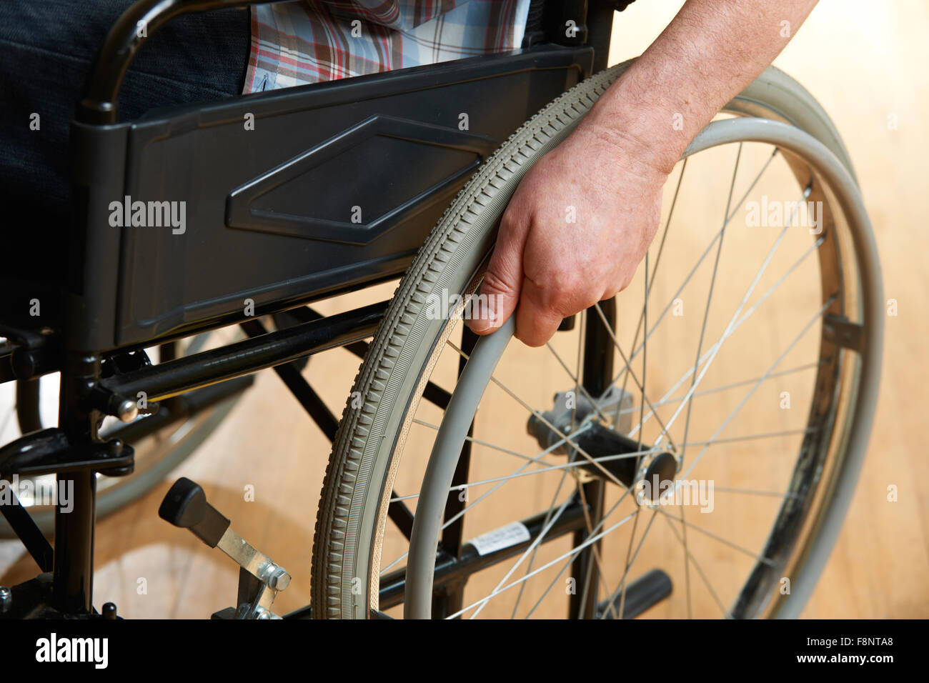 Pushing wheelchair hi-res stock photography and images - Alamy