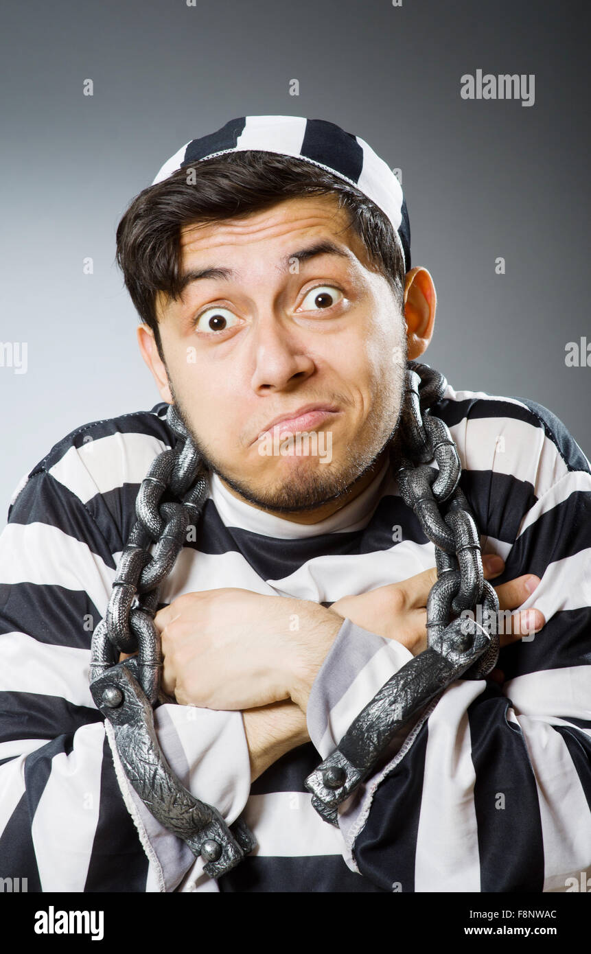 Funny prison inmate in concept Stock Photo - Alamy