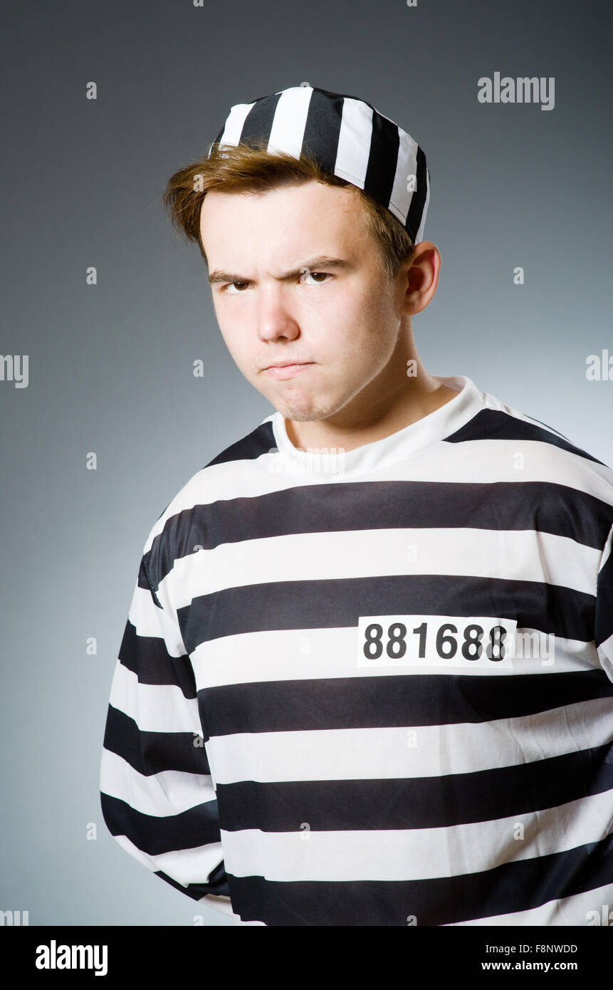 Funny prison inmate in concept Stock Photo - Alamy