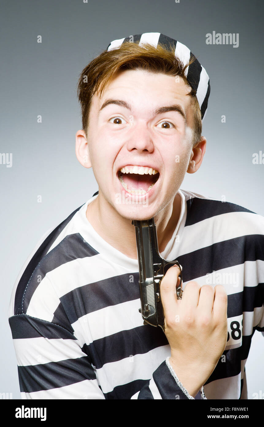 Funny prison inmate in concept Stock Photo - Alamy