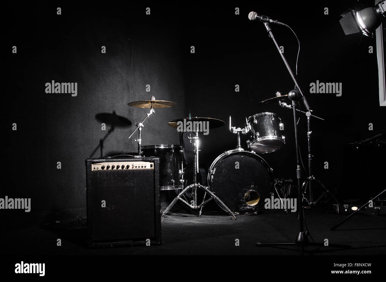 Set of musical instruments during concert Stock Photo - Alamy