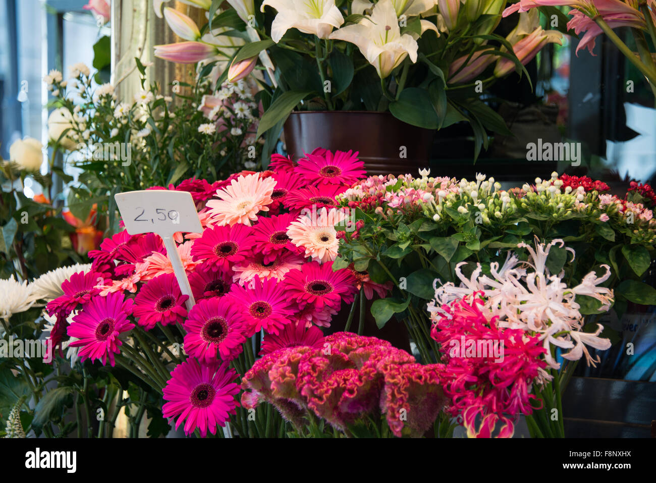 Street flower shop with colourful flowers Stock Photo - Alamy