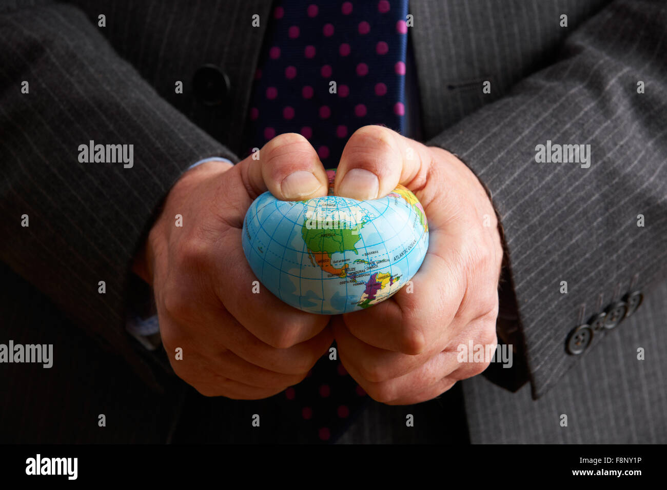 Squeezing earth hi-res stock photography and images - Alamy