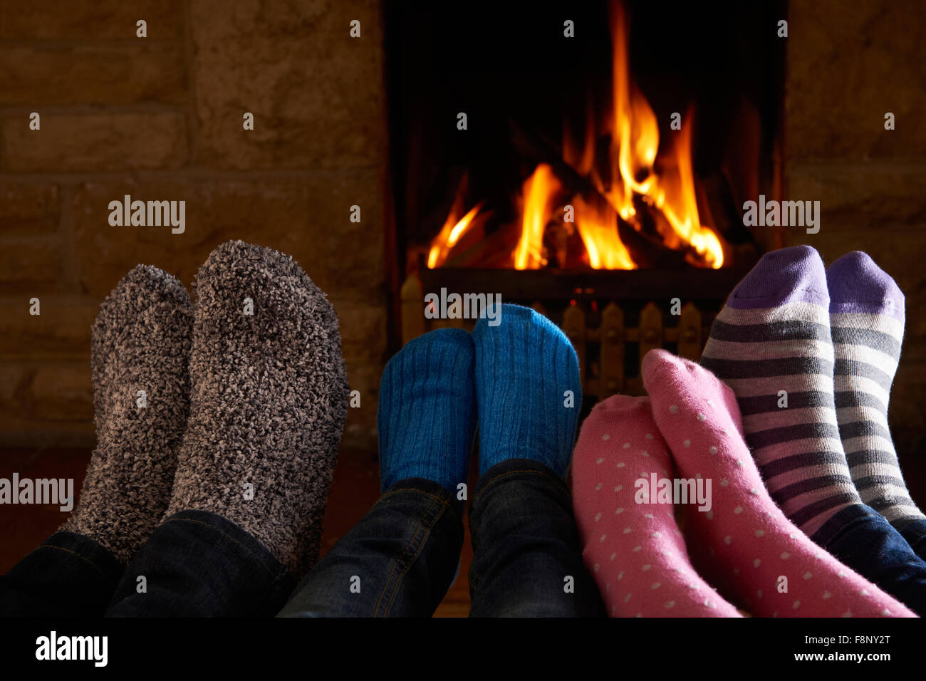 Feet to the fire hi-res stock photography and images - Alamy
