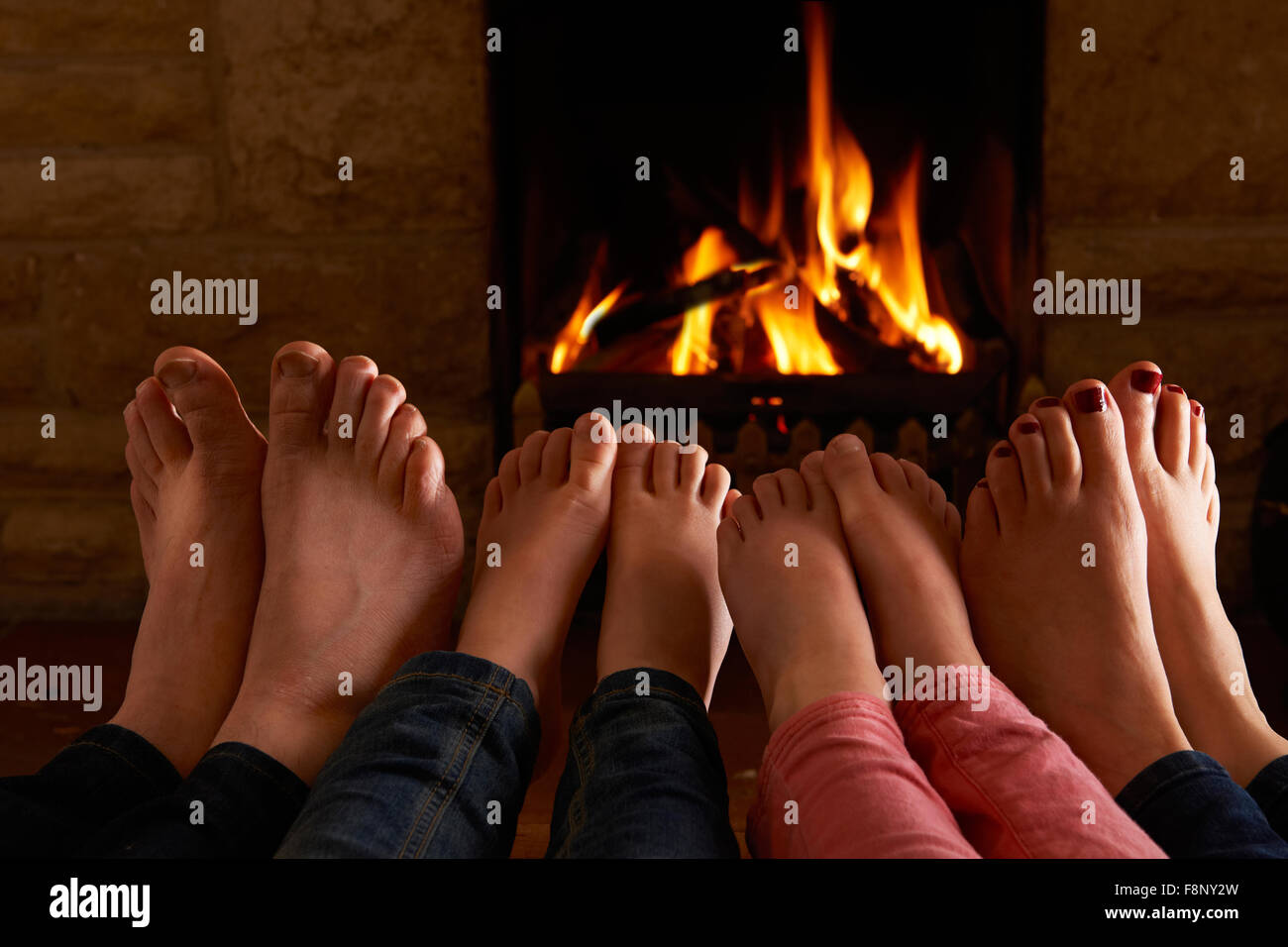 Feet to the fire hi-res stock photography and images - Alamy