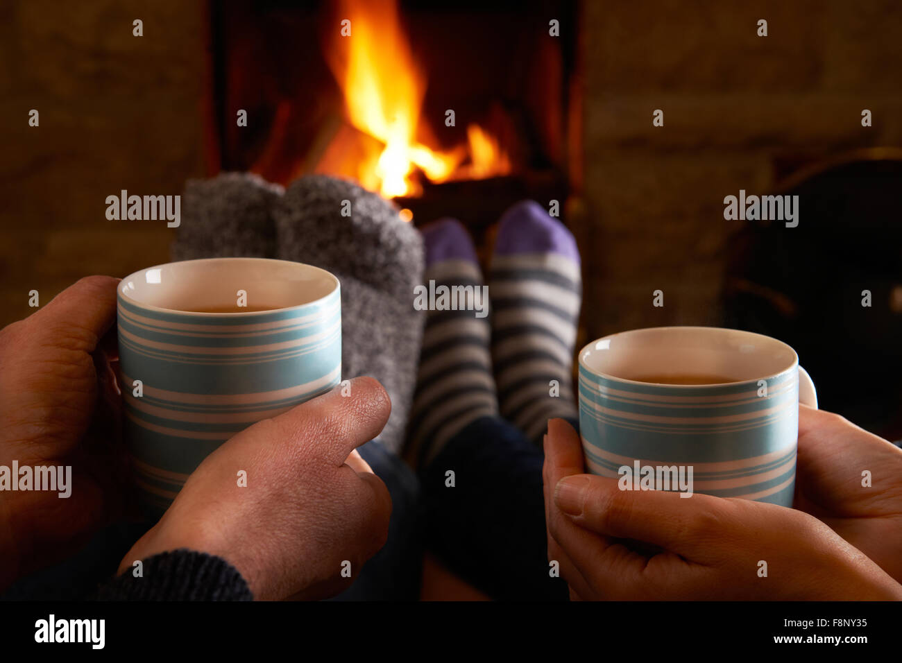 Man sitting fire drink hi-res stock photography and images - Alamy