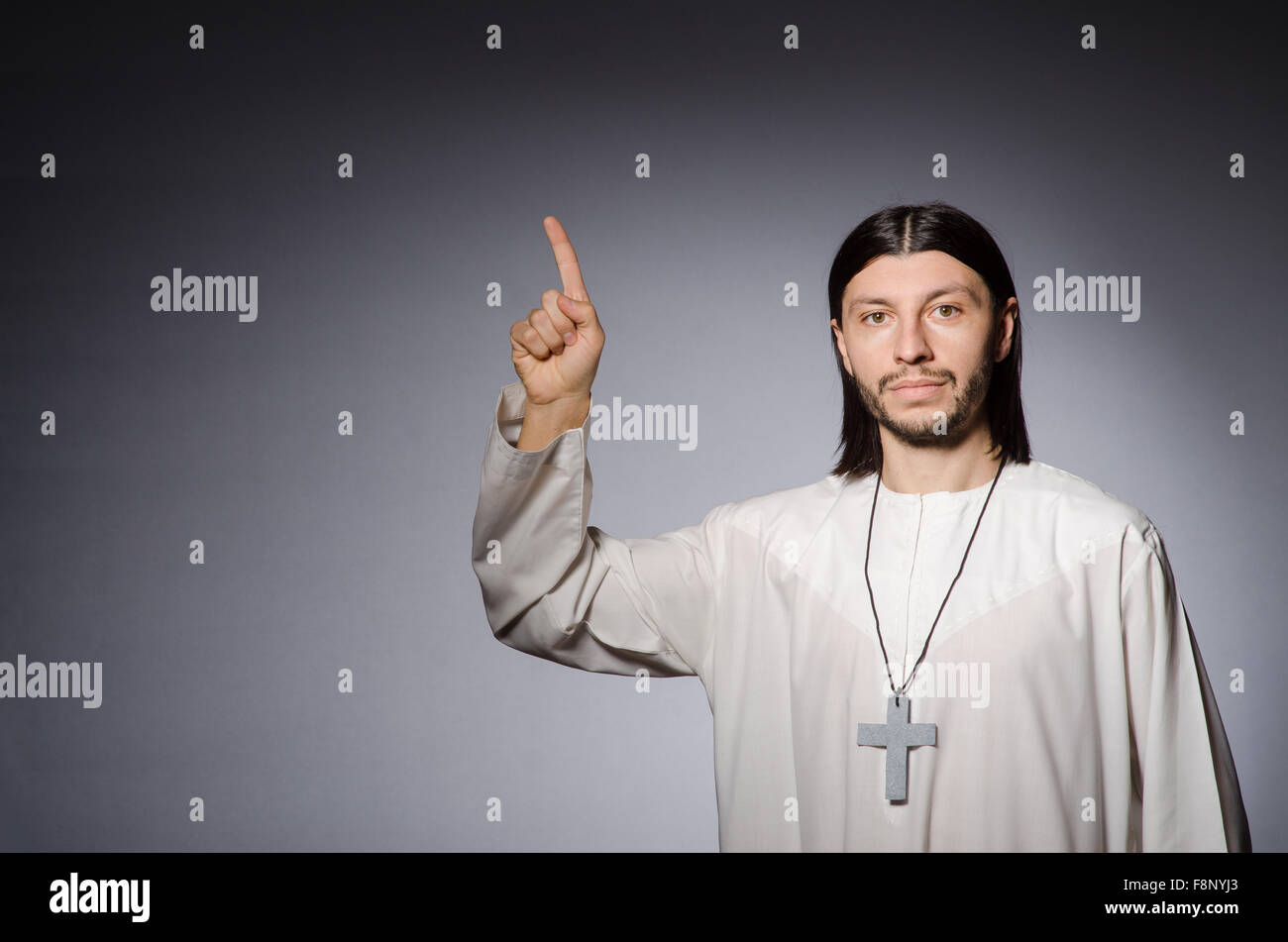 Priest man in religious concept Stock Photo - Alamy