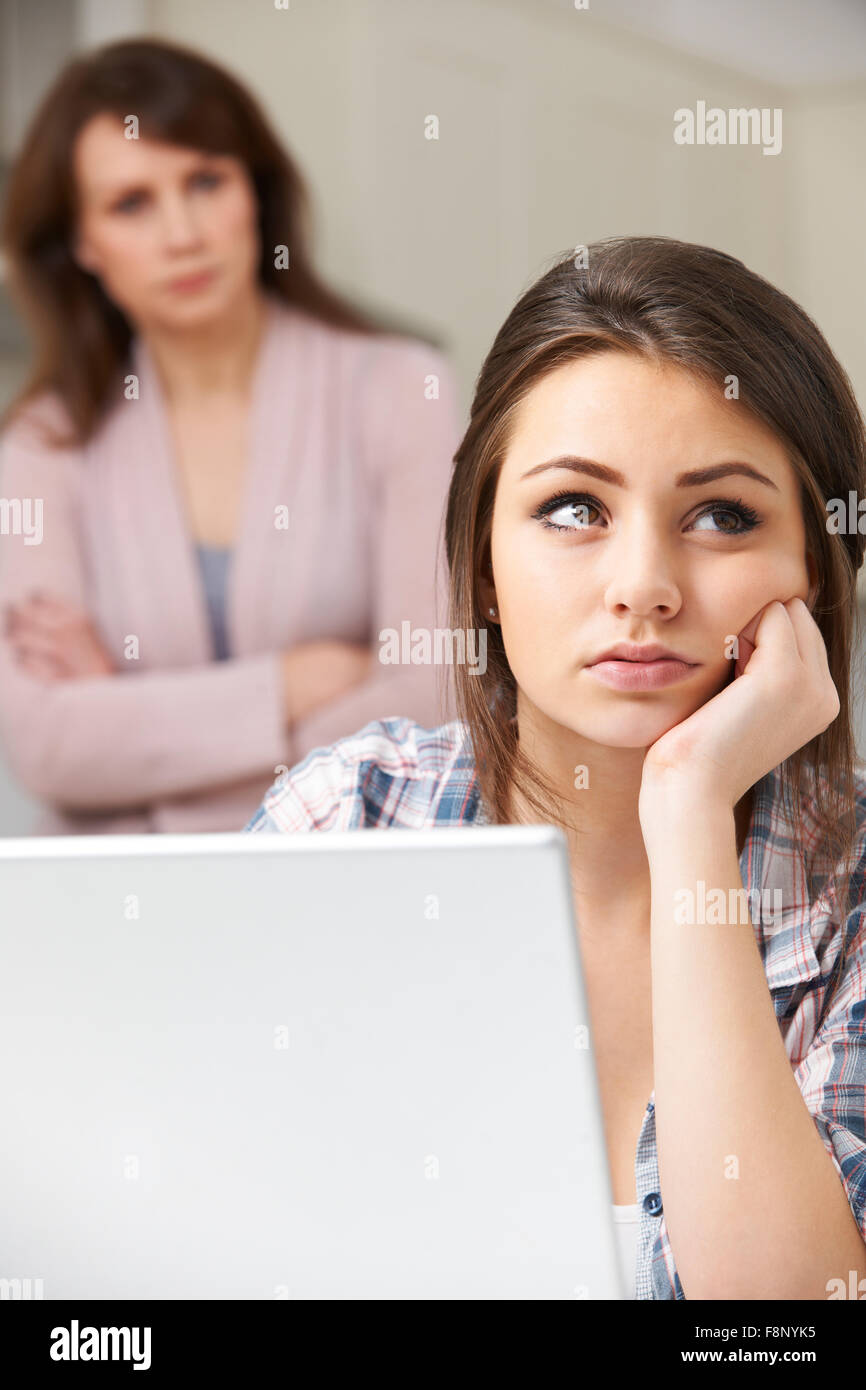 Mother Arguing With Teenage Daughter Over Online Activity Stock Photo ...