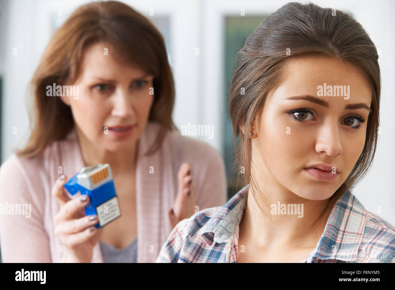 Mother Talking To Teenage Daughter About Dangers Of Smoking Stock Photo ...