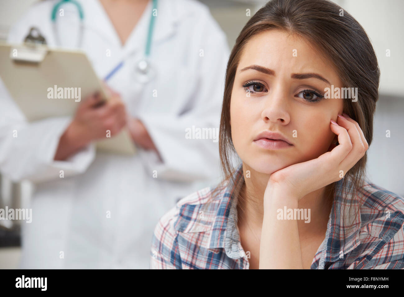 Teenage Girl With Appointment At Doctor's Surgery Stock Photo - Alamy