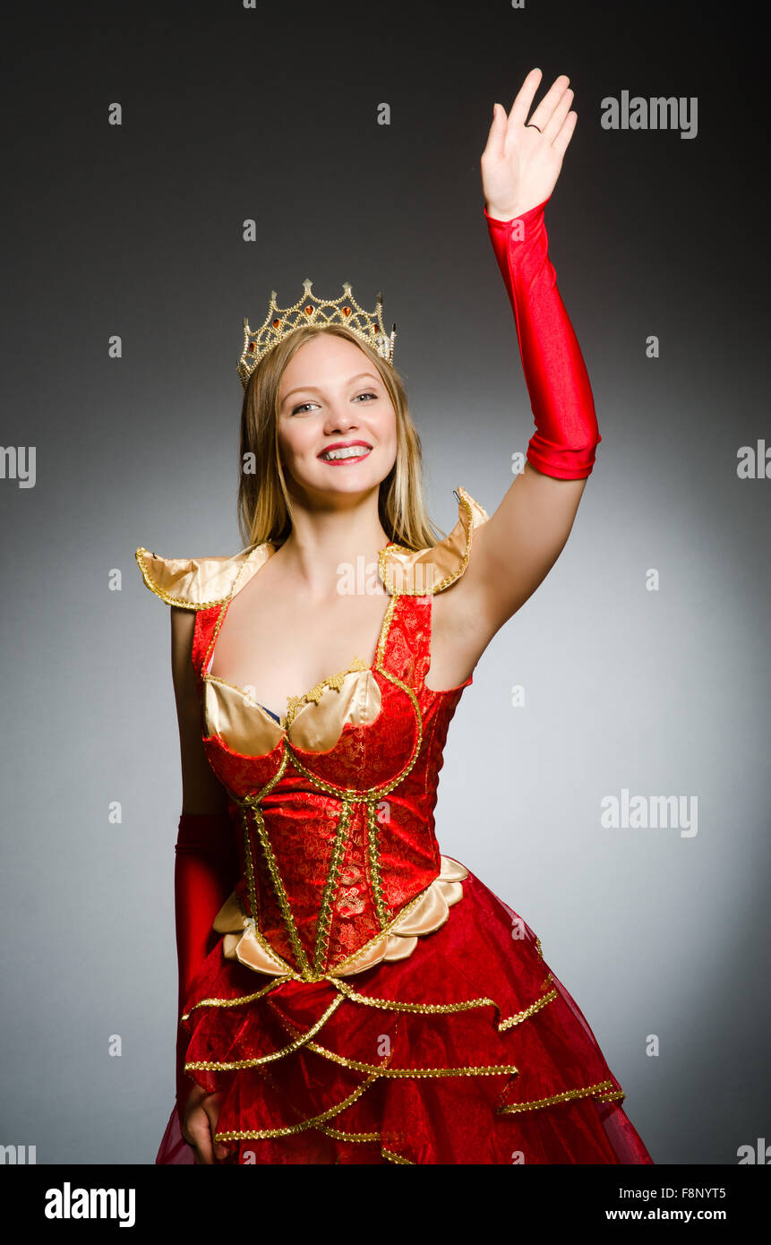 Angry queen against dark background Stock Photo - Alamy