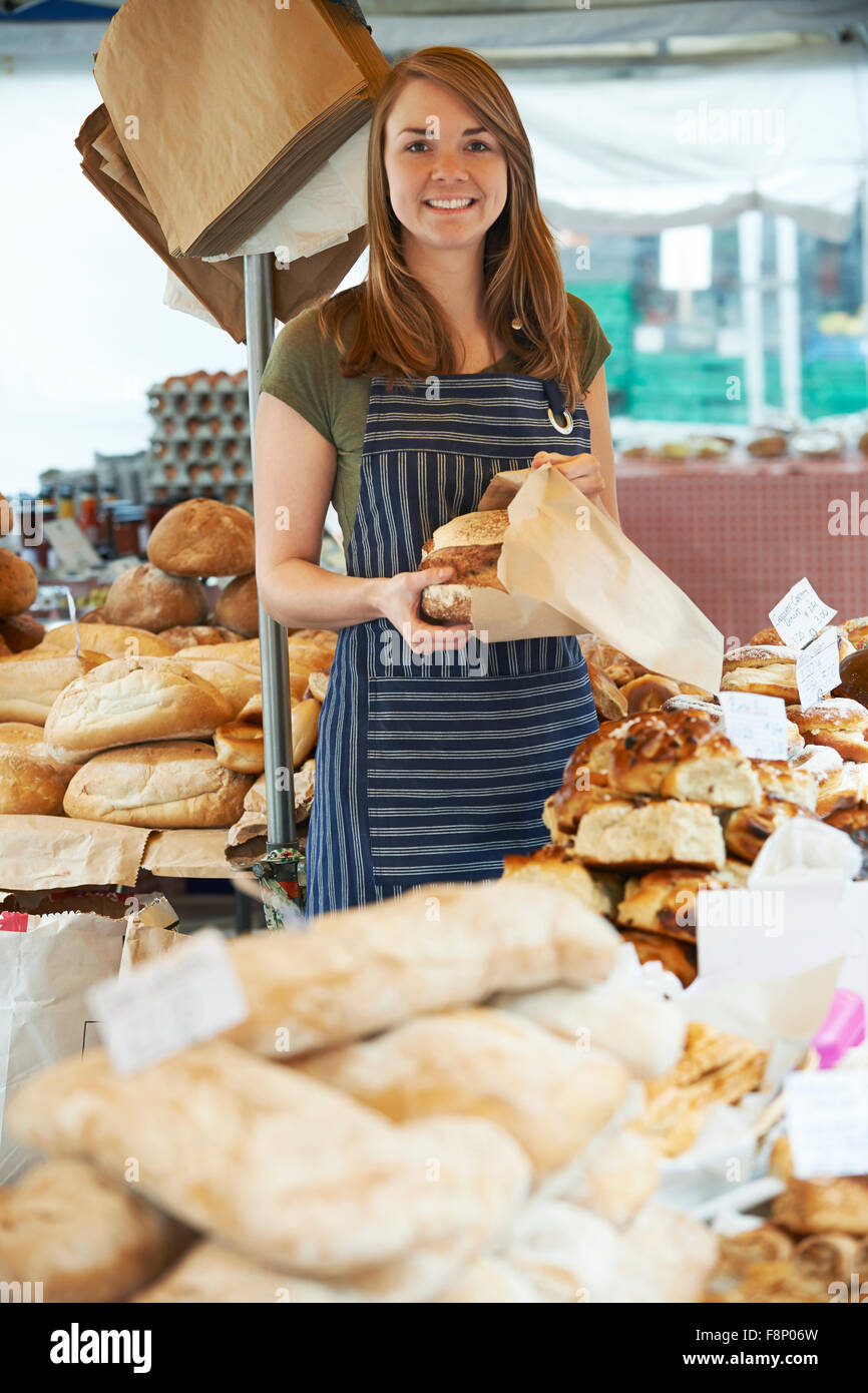 Owner Of Bread Stall At Outdoor Market Stock Photo - Alamy