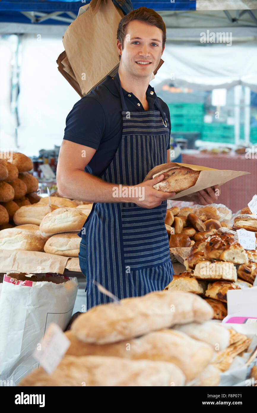Owner Of Bread Stall At Outdoor Market Stock Photo - Alamy