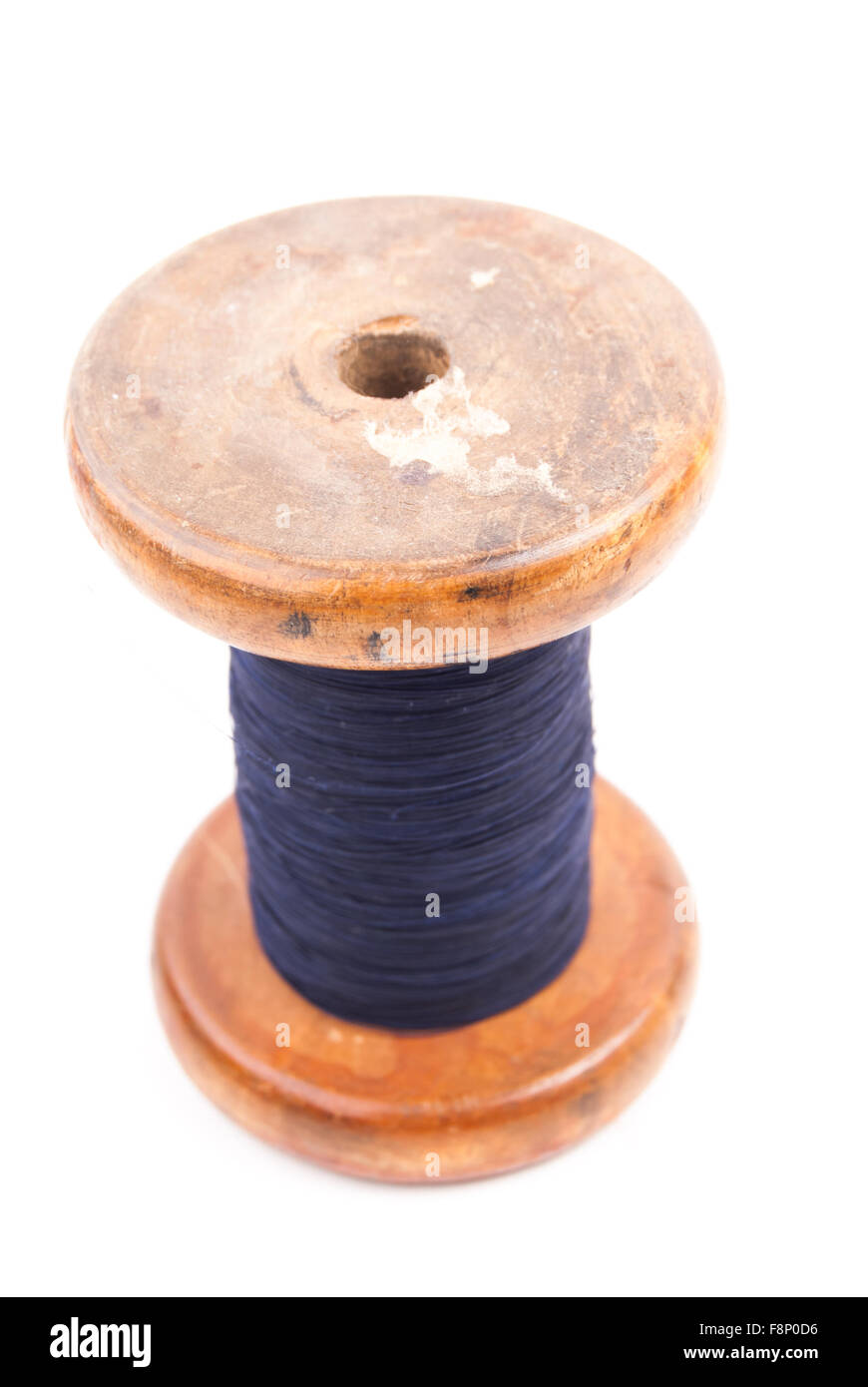 spool of thread with needle Stock Photo - Alamy