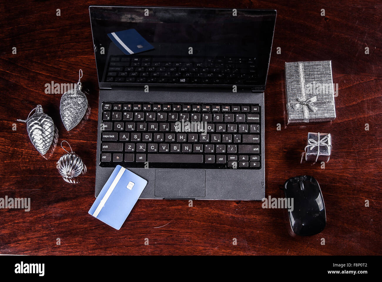 black laptop on wood Stock Photo - Alamy