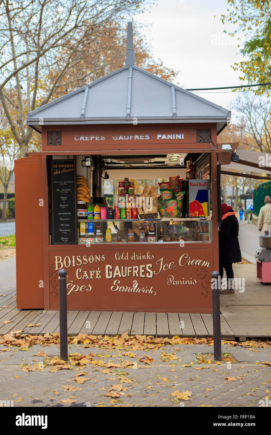 A small kiosk selling drinks, snacks and souvenirs near the Eiffel ...