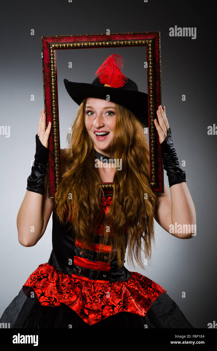 Woman pirate with picture frame Stock Photo - Alamy