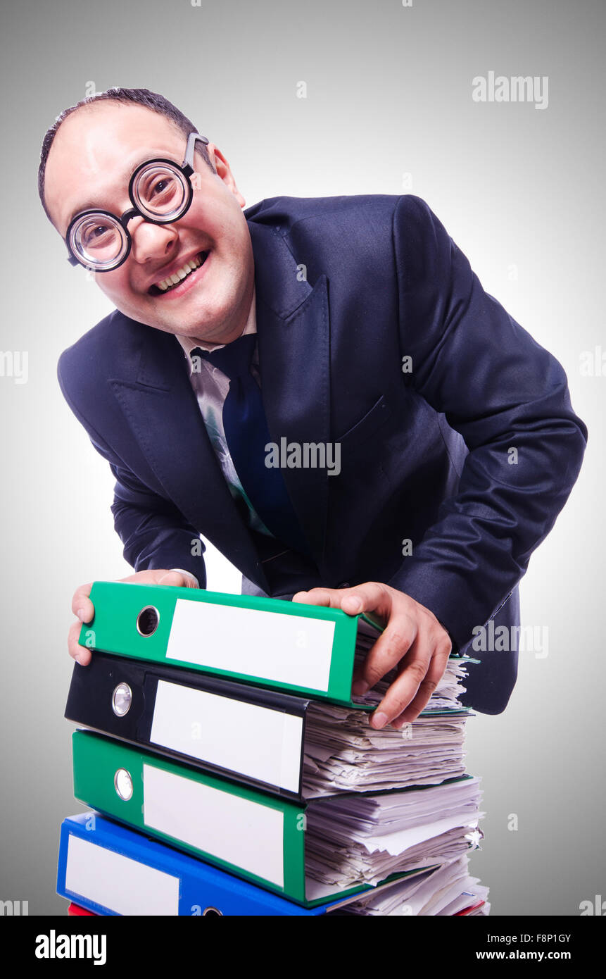 Funny man with lots of folders on white Stock Photo - Alamy