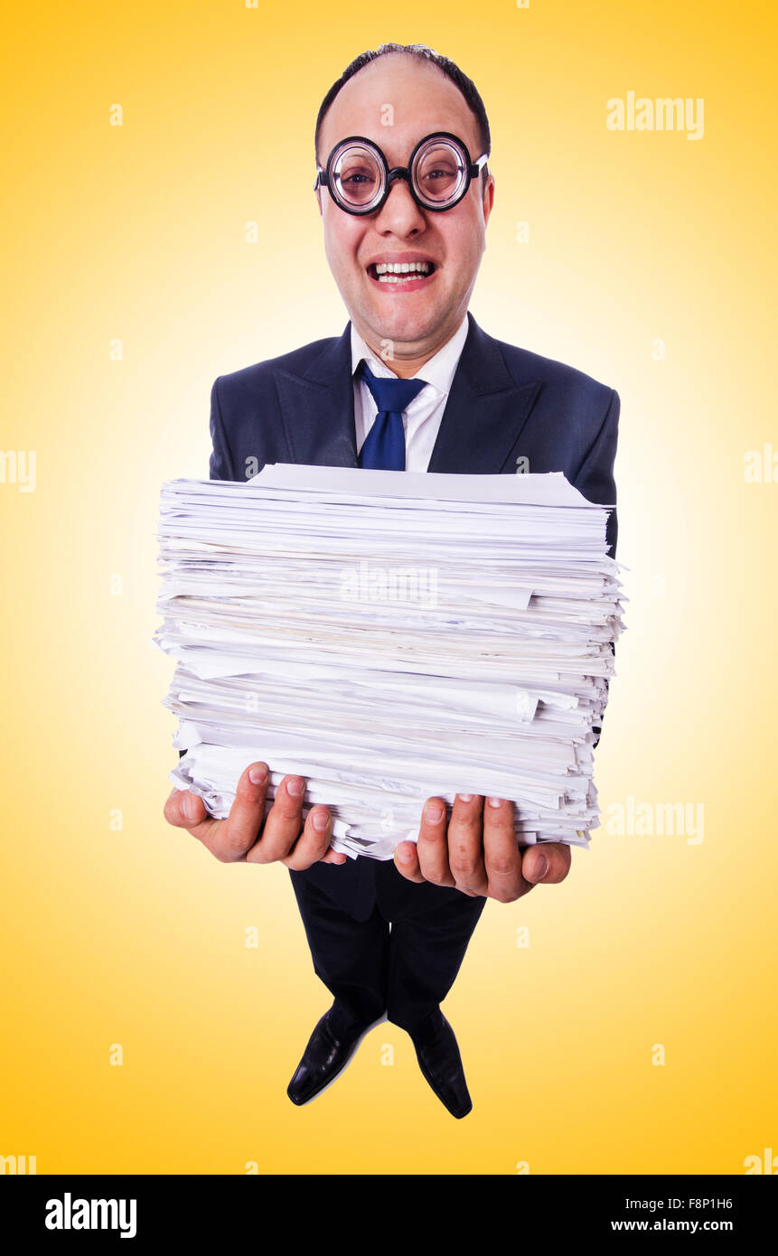 Funny man with lots of folders on white Stock Photo - Alamy