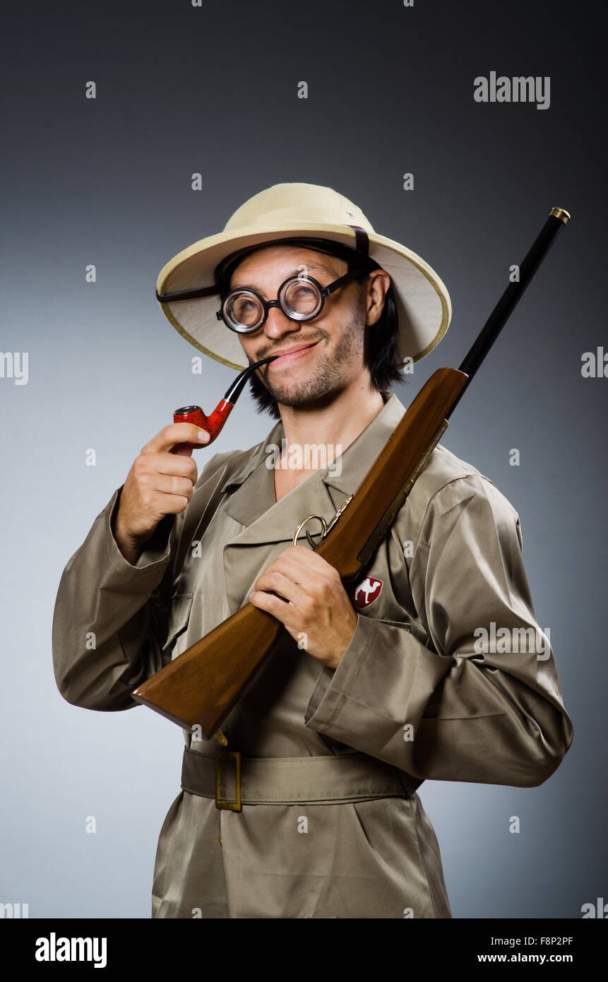 Hunter with rifle and smoking pipe Stock Photo - Alamy