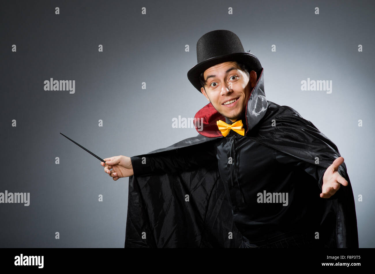 Funny magician man with wand and hat Stock Photo - Alamy